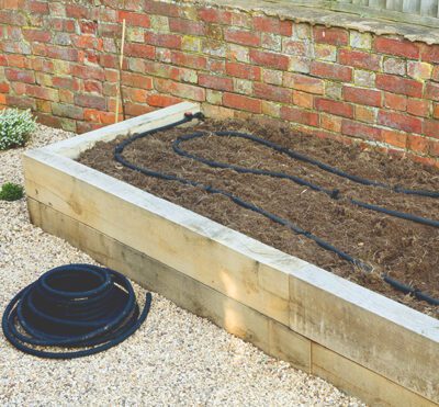 How to Use a Soaker Hose in a Vegetable Garden & Other Areas | Eaton ...